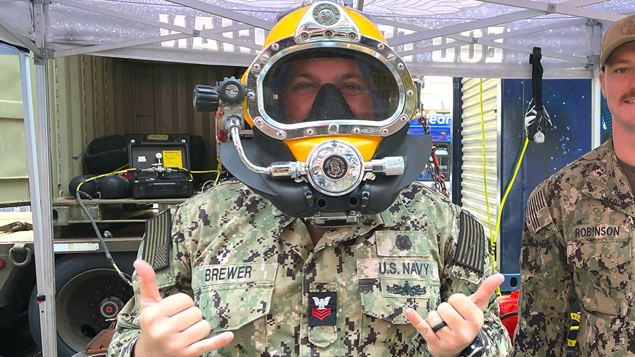 The dive-tank experience during NYC's Fleet Week in Times Square is ...